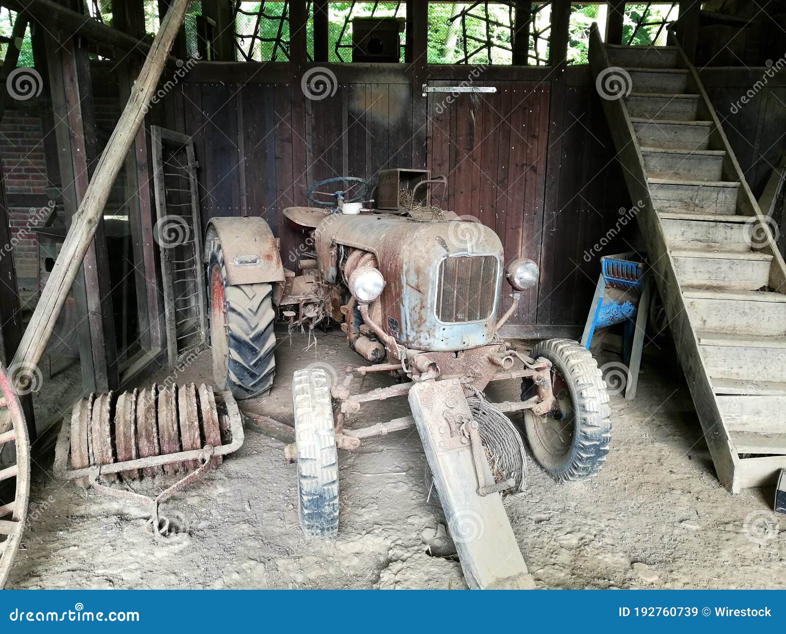 Old Aged and Rusty Tractor in the Barn Covered in Dust Stock Image ...