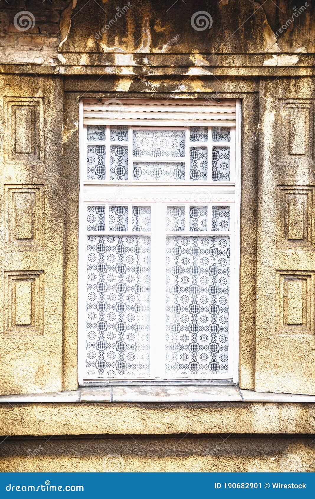 Old, Aged and Weathered Window with White Curtains with Decorations ...