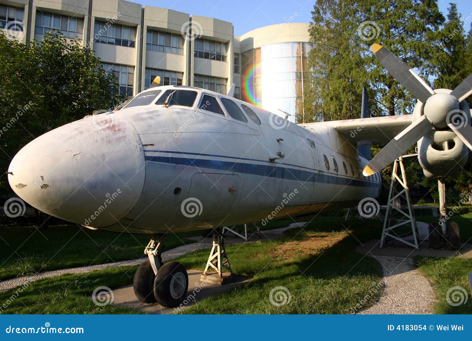 Old airplane near building stock photo. Image of plane - 4183054