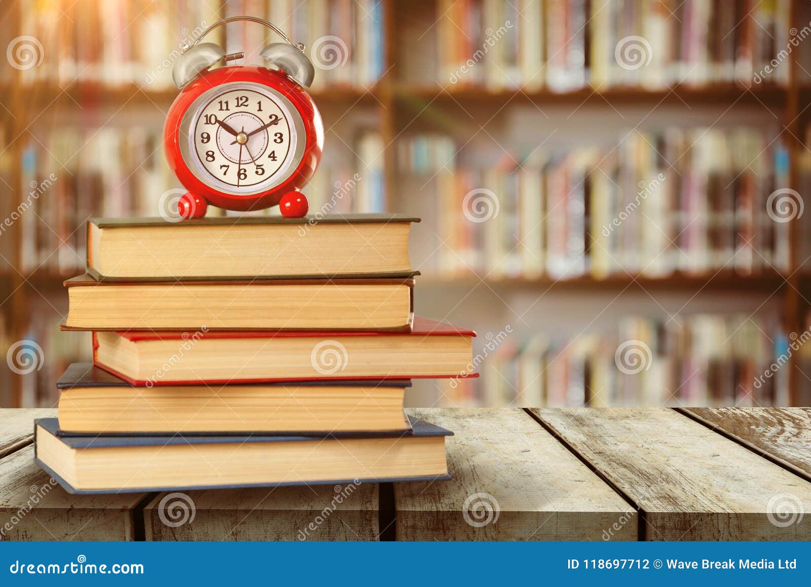 Composite Image of Old Alarm Clock and Stack of Books Stock Photo ...