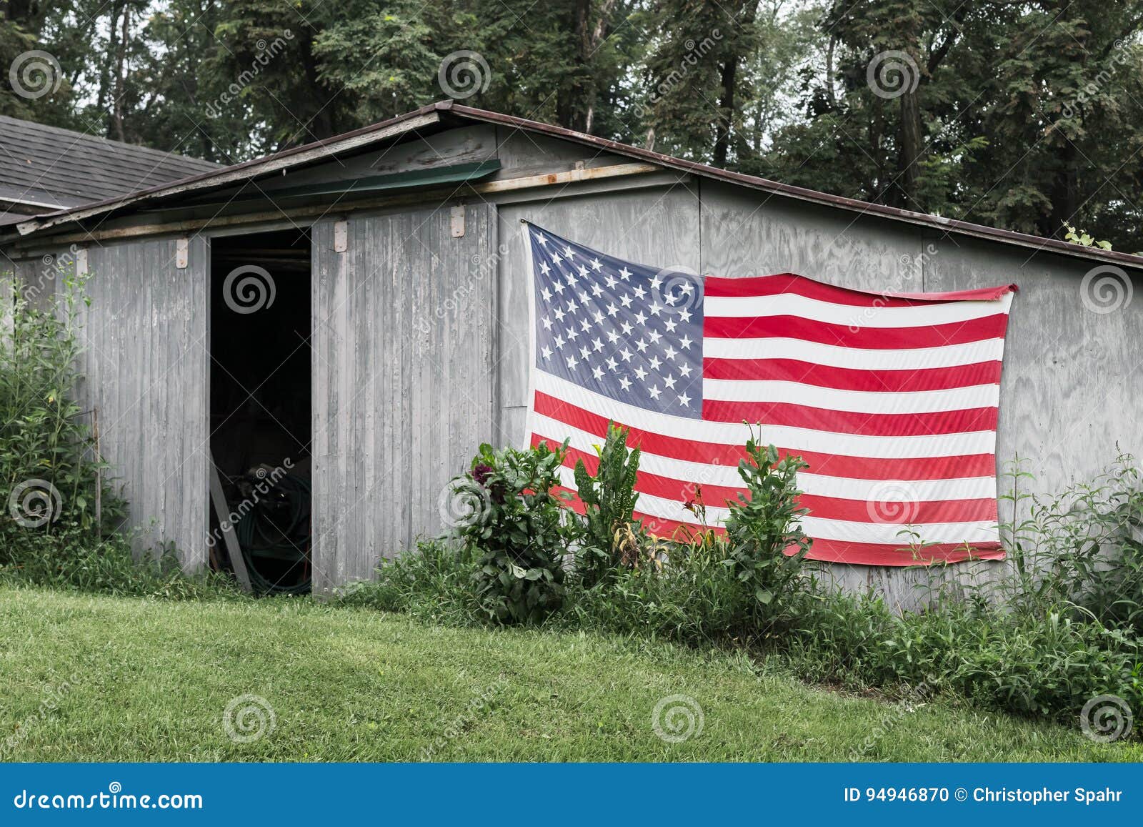 Old American Flag on a Barn Stock Photo - Image of states, scenic: 94946870