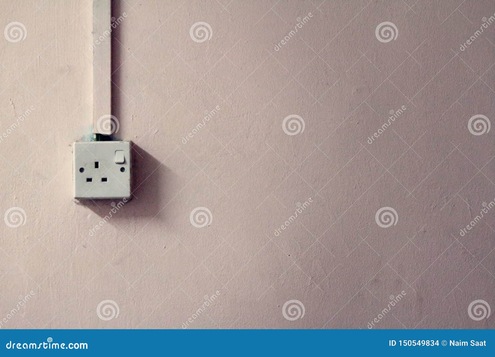 Plug In Power Outlet Adapter Cord Charger On A White Wall Of The Laptop ...