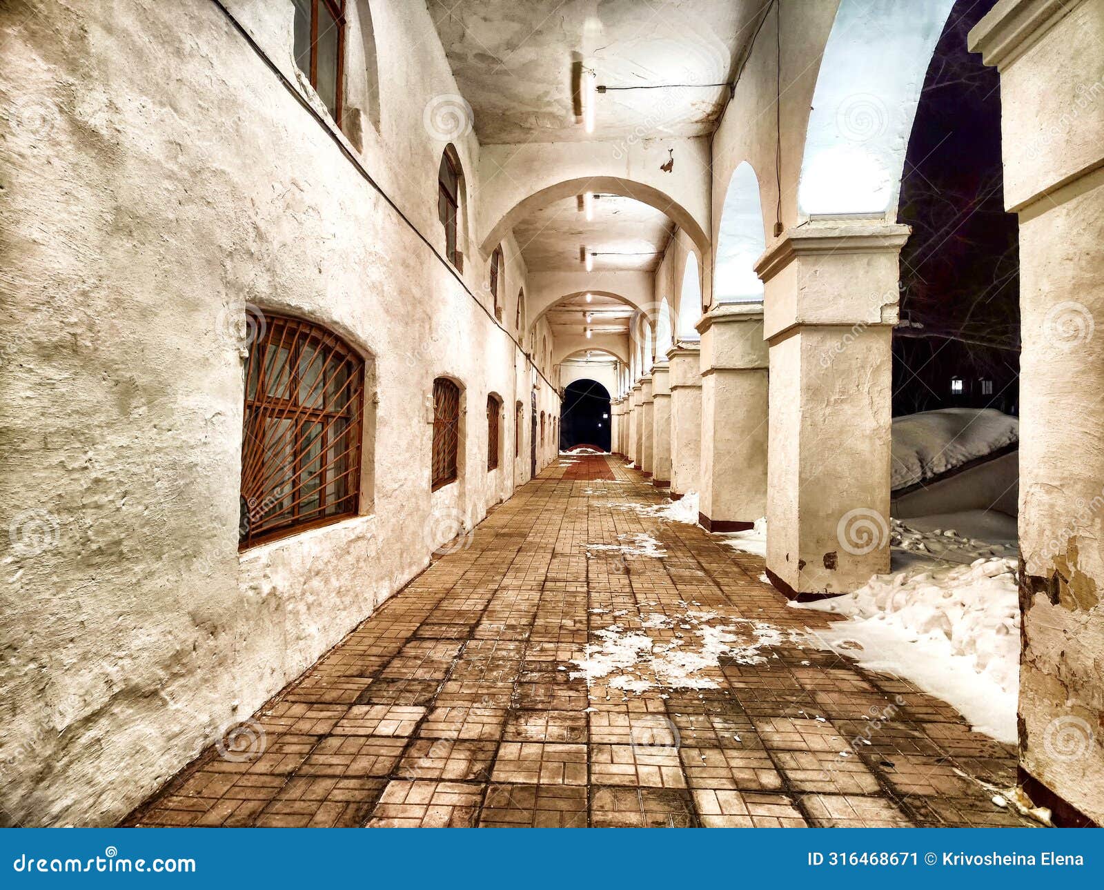 Old Ancient Colonnade Pathway at Night. Dimly Lit Corridor with Arches ...