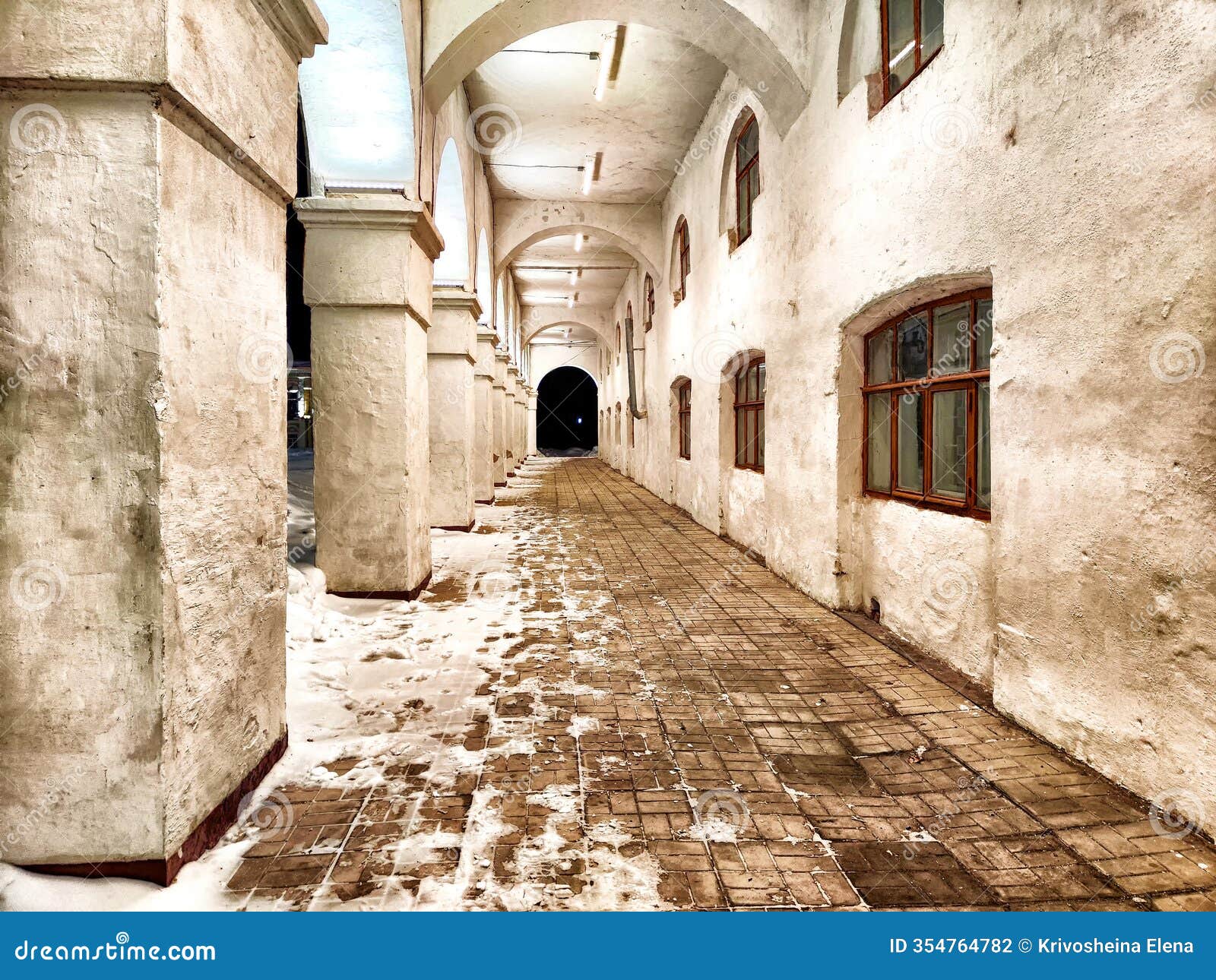 Old Ancient Colonnade Pathway at Night. Dimly Lit Corridor with Arches ...