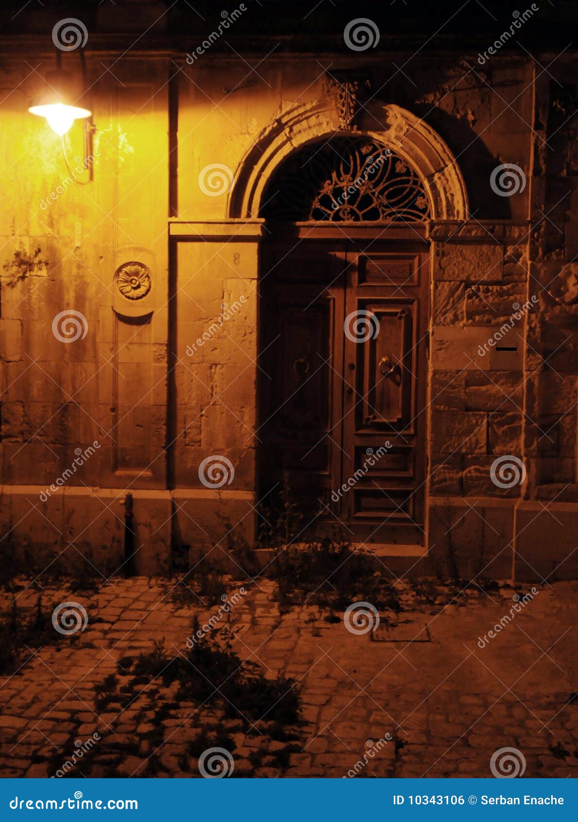 Old antique door at night stock photo. Image of entry - 10343106
