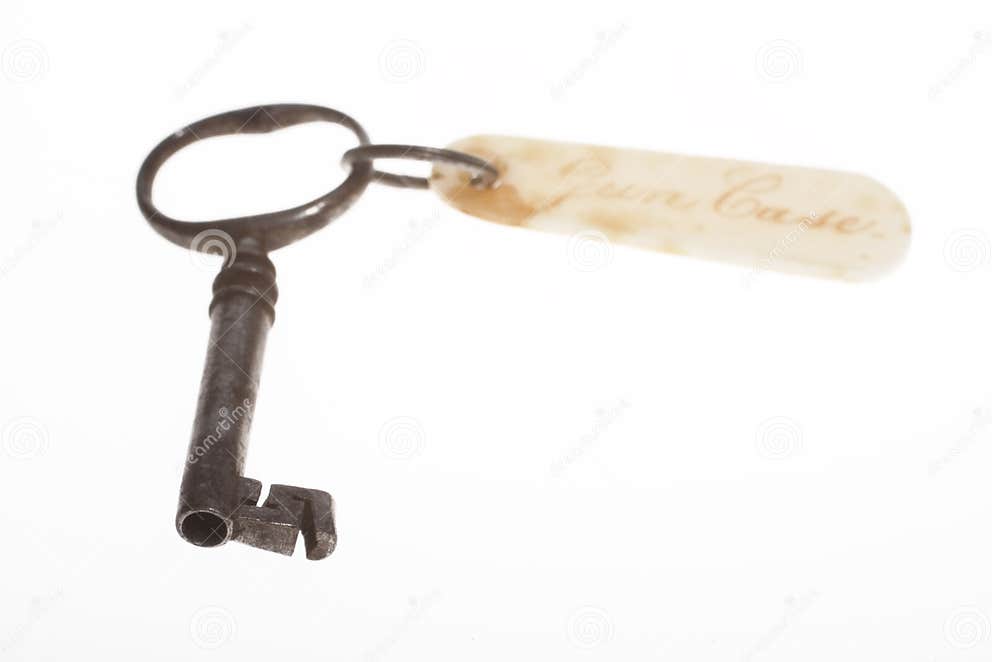 Old Antique Key with Badge on White Stock Photo - Image of chain, bone ...