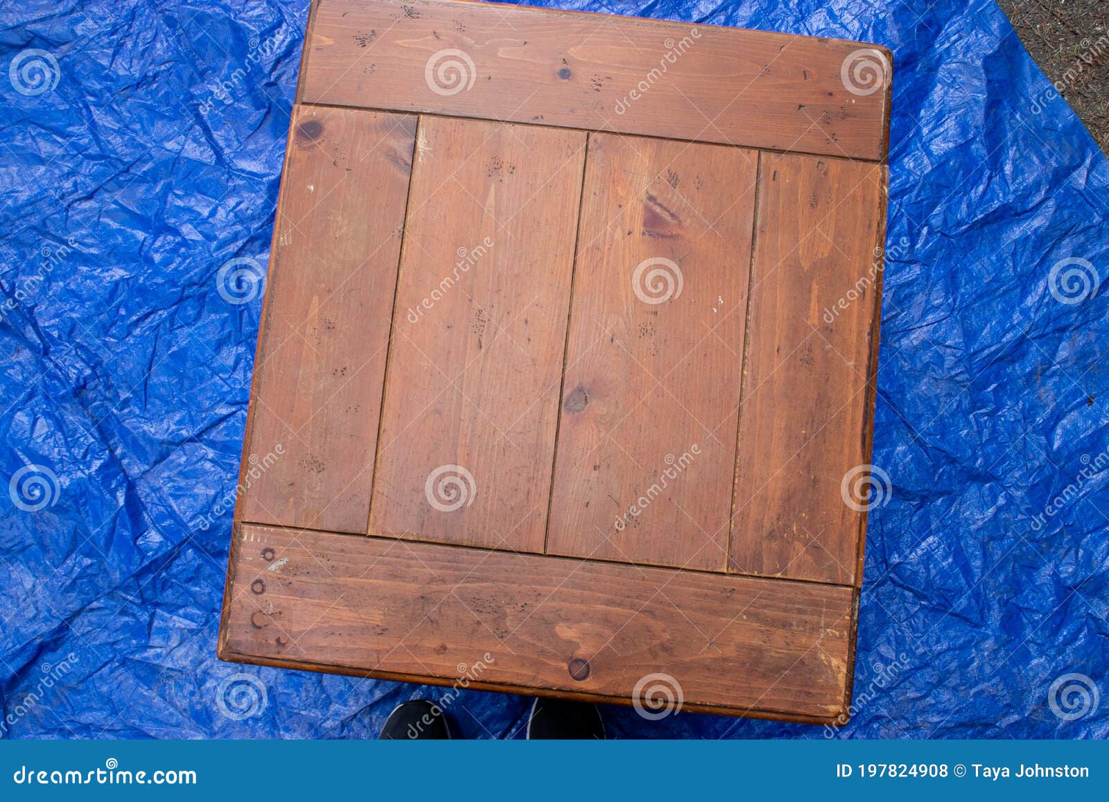 Old Antique Table Set Out on a Blue Tarp Stock Photo - Image of blue ...