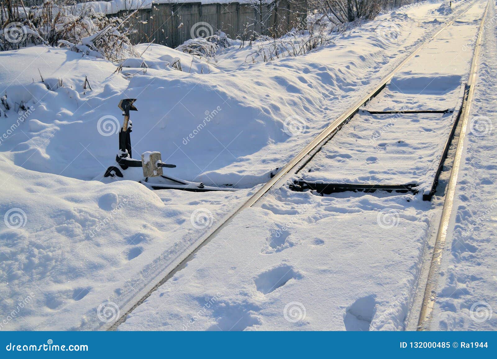 Old Arrow Train and Railway Tracks in the Winter Under the Snow Stock ...