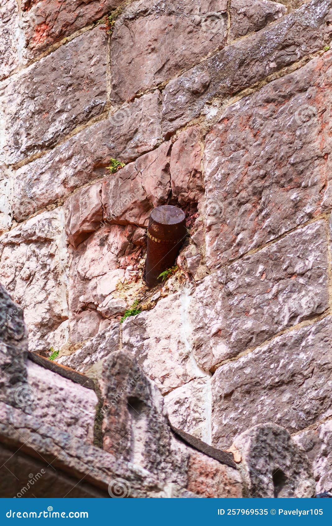 Old Artillery Shell in the Destroyed Wall of the Building Stock Image ...