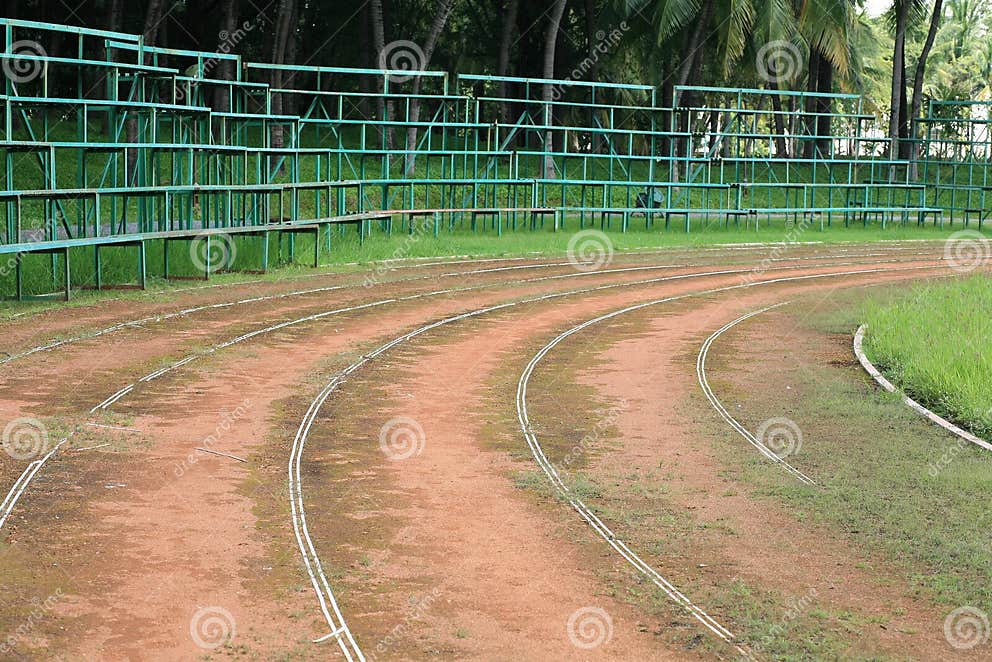 Old Athletic Curved Track with Bleacher Stock Image - Image of closeup ...