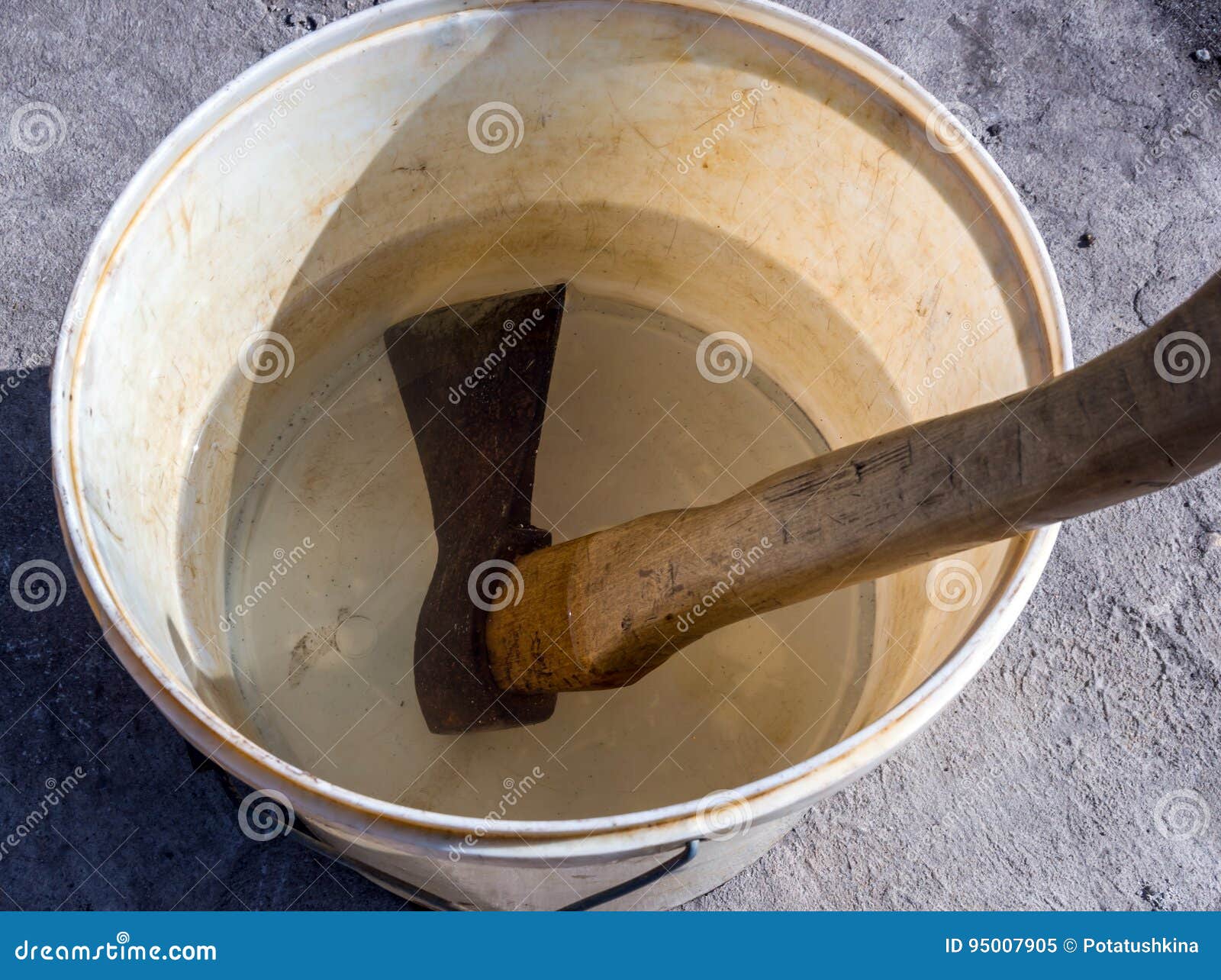 The Old Ax Lies in a Bucket of Water Stock Image - Image of danger ...