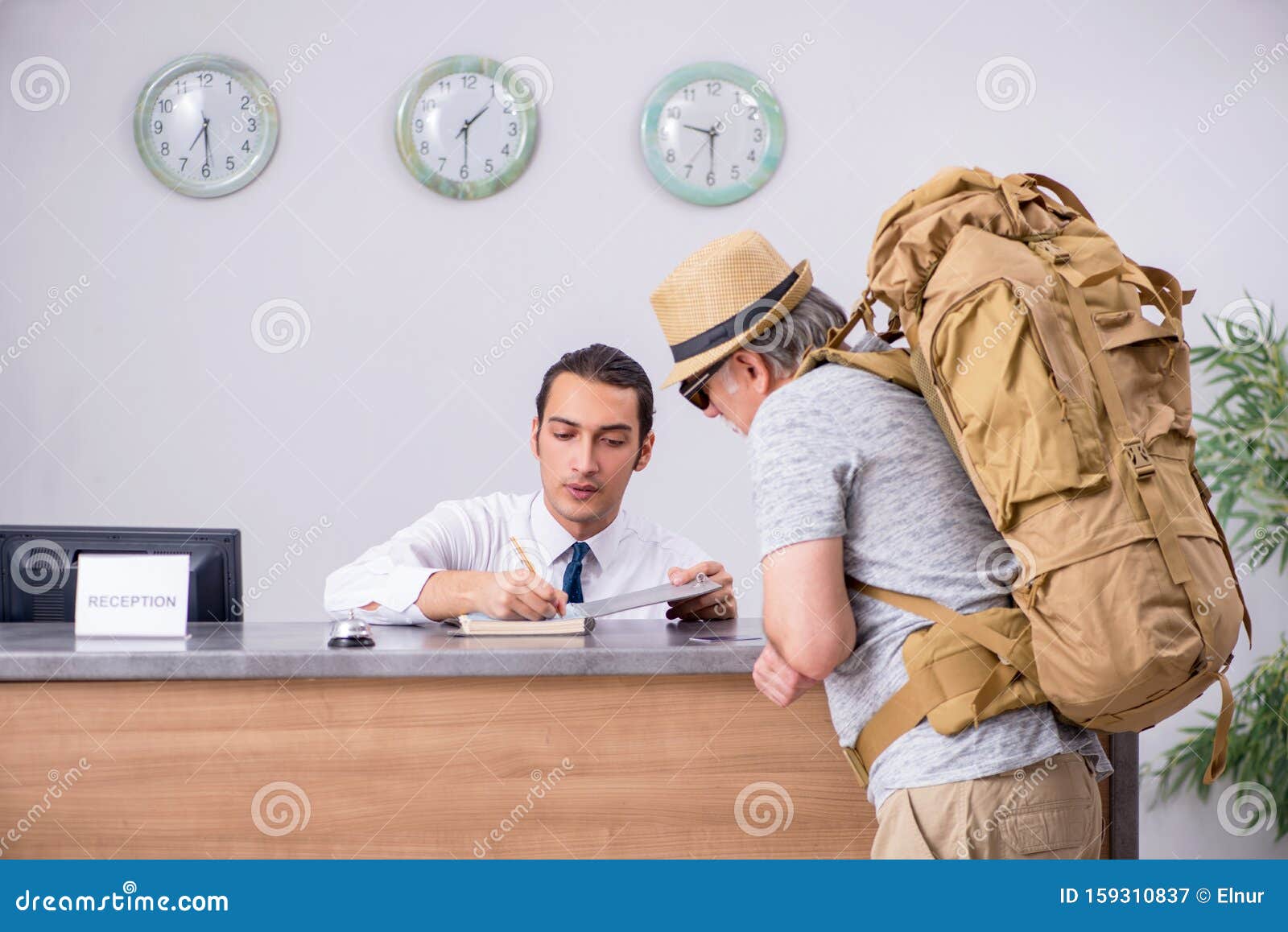 Backpacker at the Hotel Reception Stock Image - Image of guest ...
