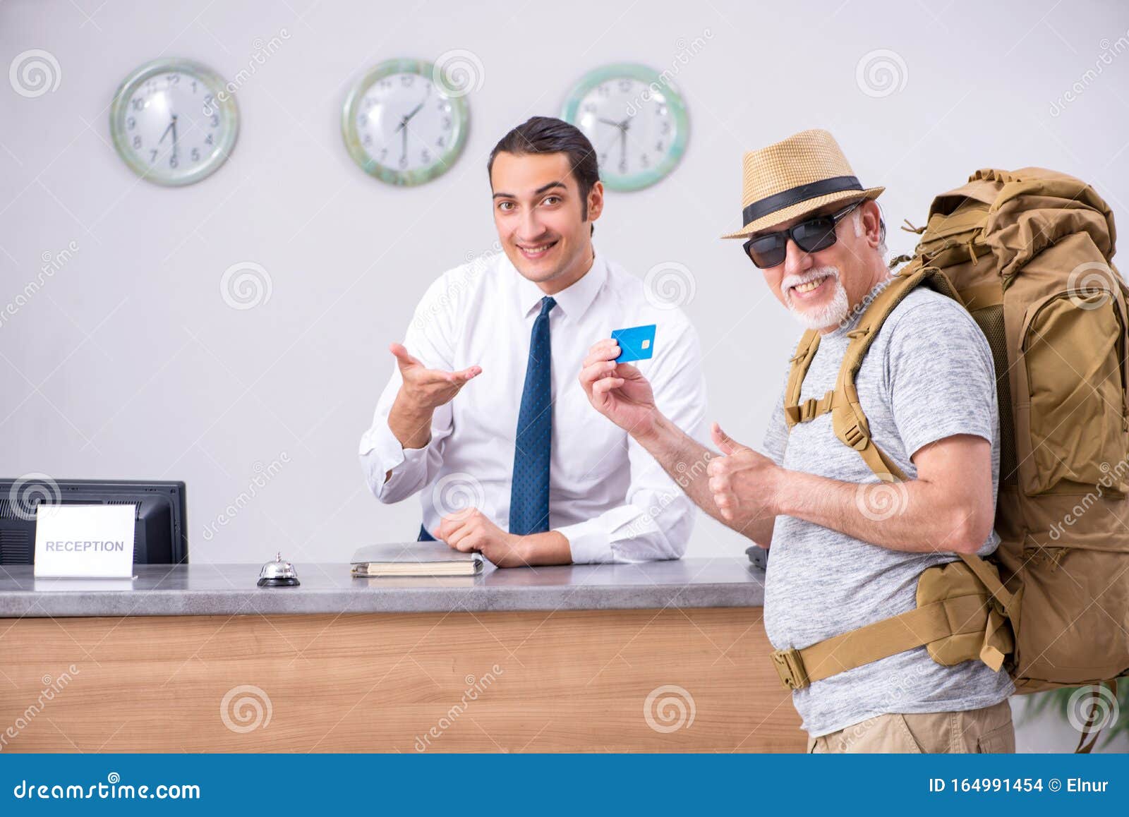 Backpacker at the Hotel Reception Stock Photo - Image of hostel ...