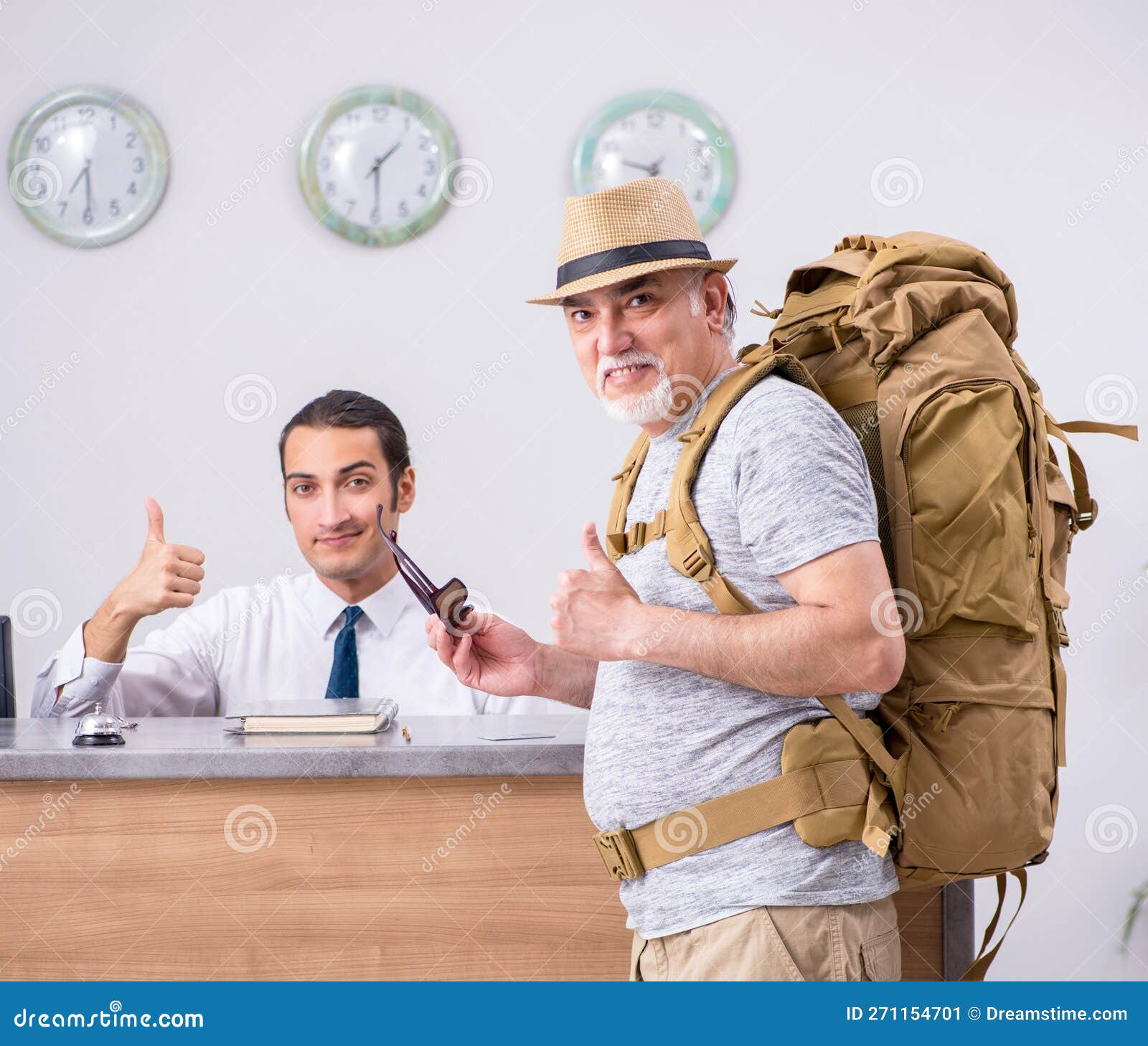 Backpacker at the Hotel Reception Stock Image - Image of business ...