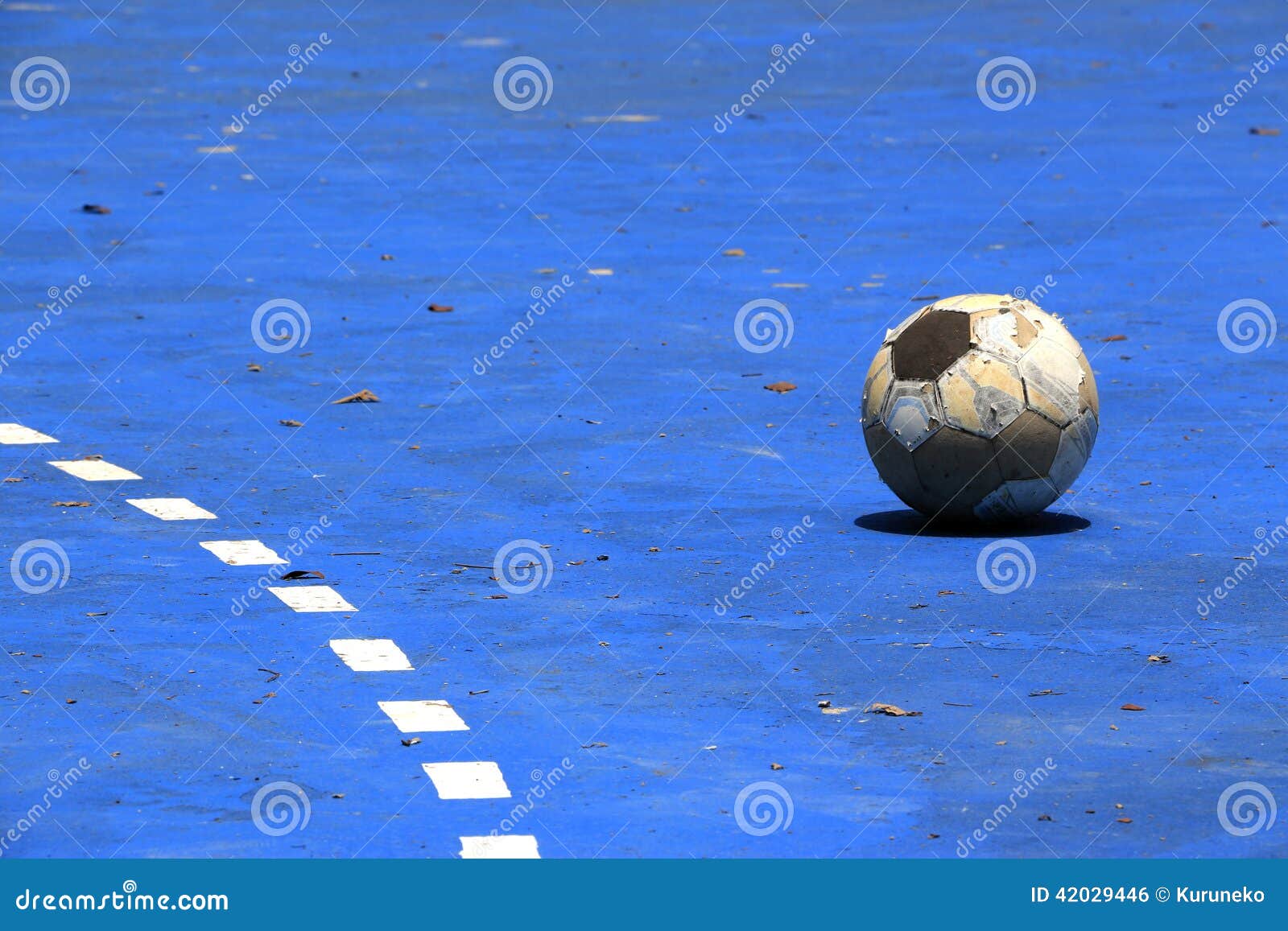 An Old Ball in a Blue Cement Field Stock Photo - Image of kick, outdoor ...