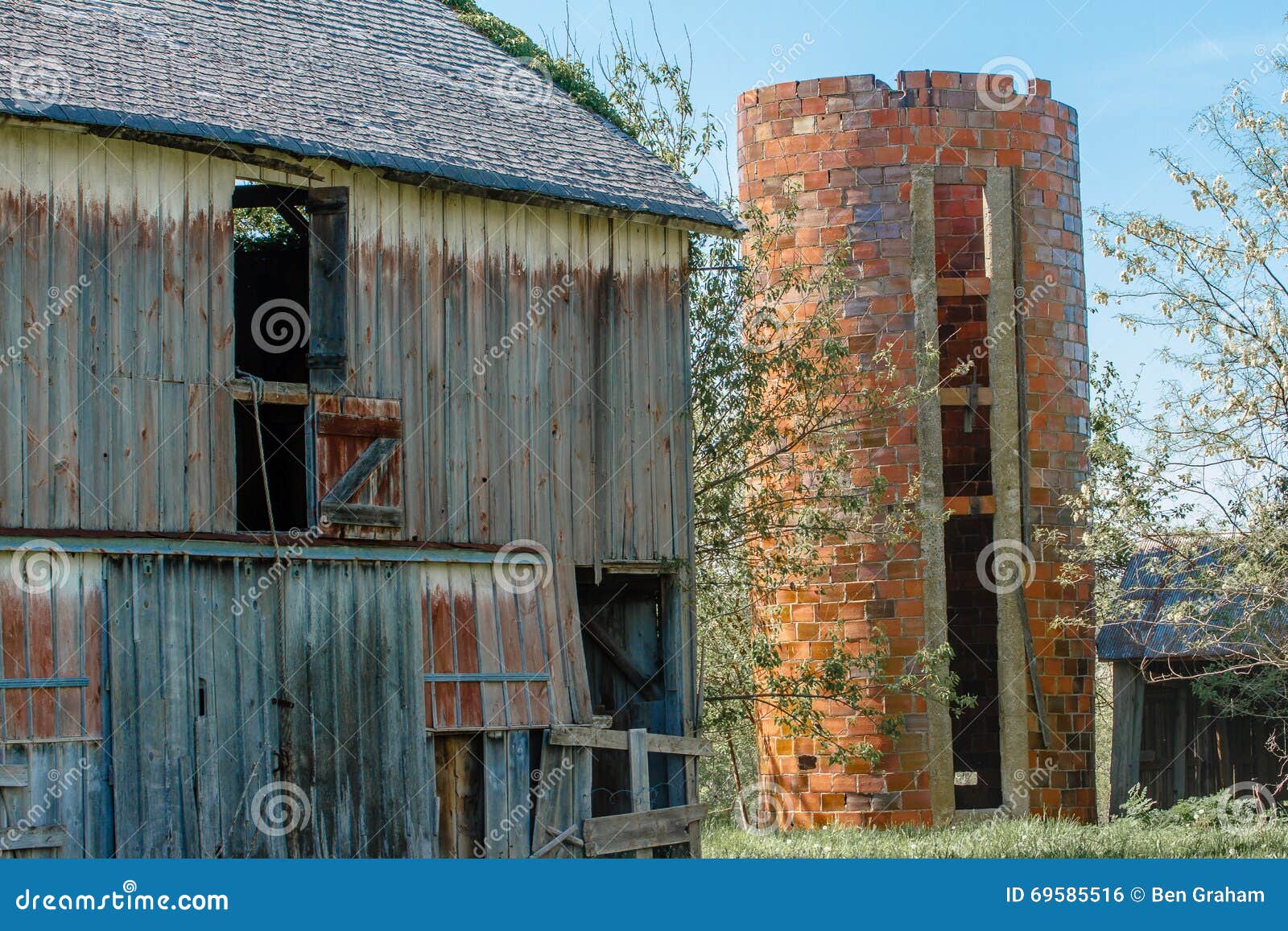 Old Barn and Brick Silo stock photo. Image of grain, farm - 69585516