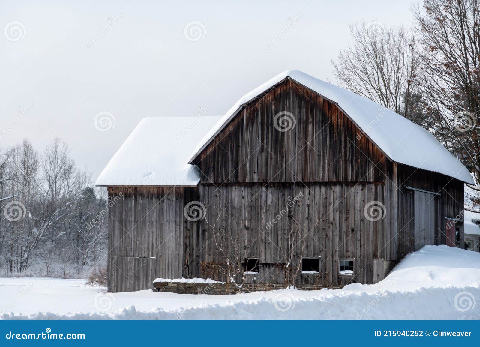 Old Barn Covered in Snow stock photo. Image of finland - 215940252
