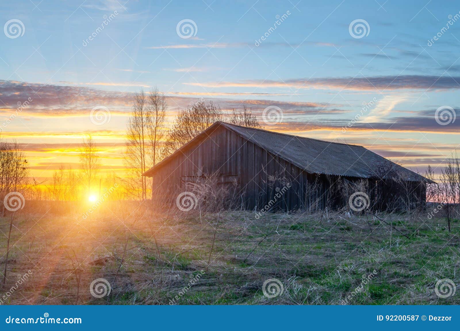 Old Barn on a Hill and the Sunset in a Rural Village Location. Stock ...