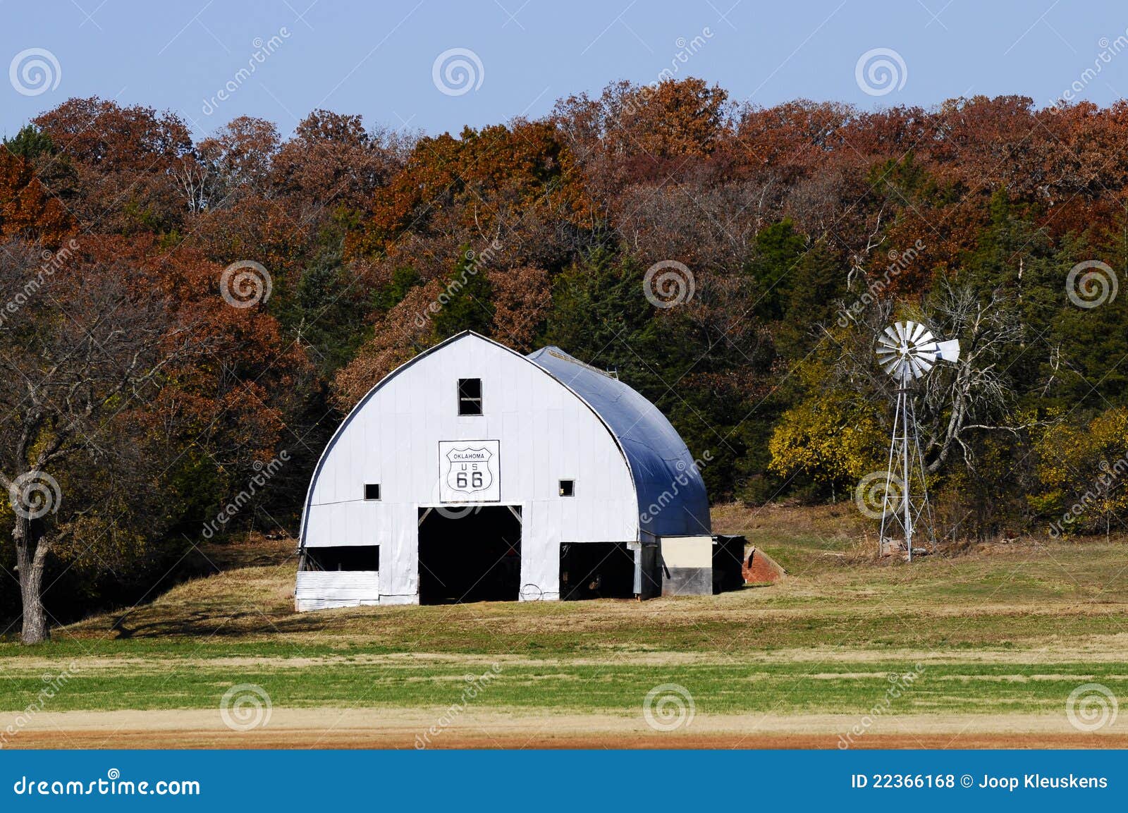Old barn with windmill stock photo. Image of farmland - 22366168