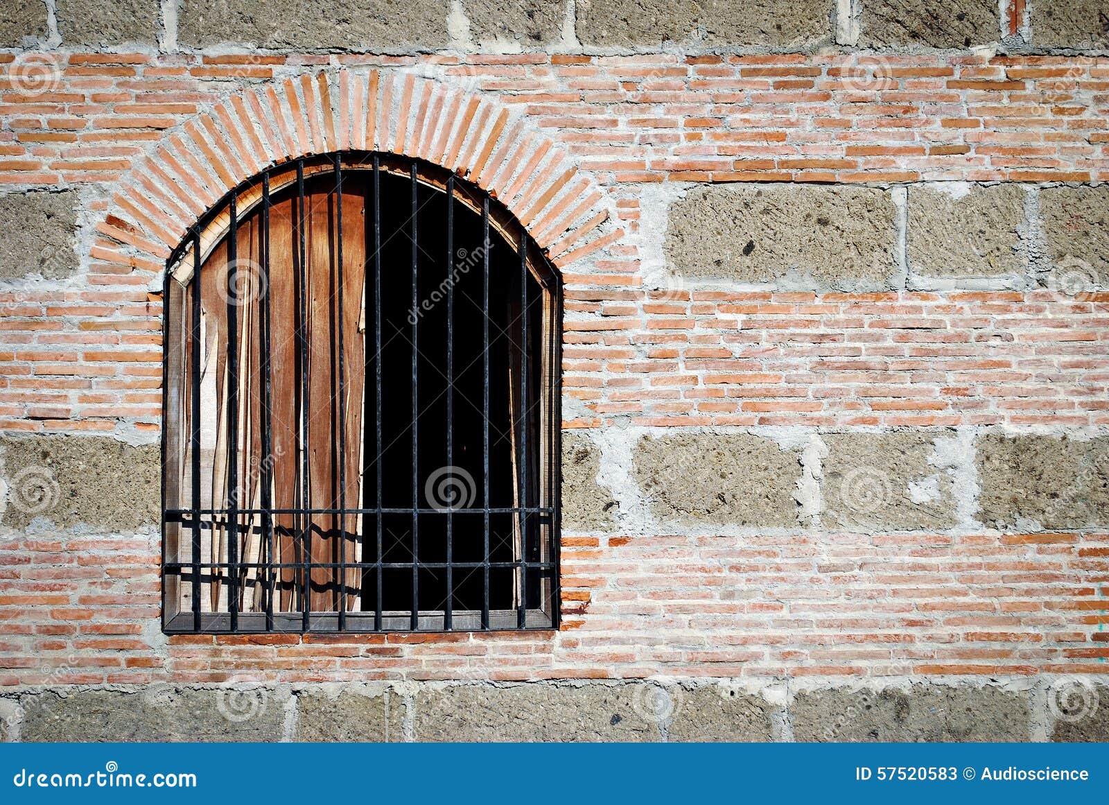 Old Barred Window on a Brick and Stone Wall Stock Image - Image of ...