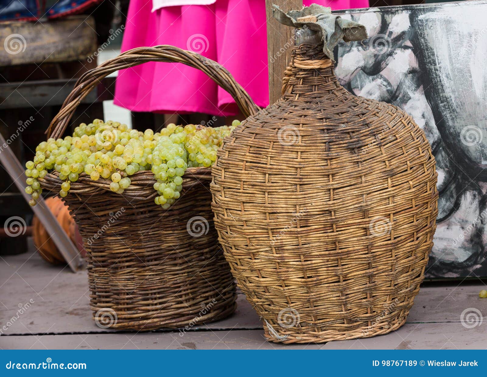 Old Barrels and Tools for Wine Production and Baskets with Grapes Stock ...