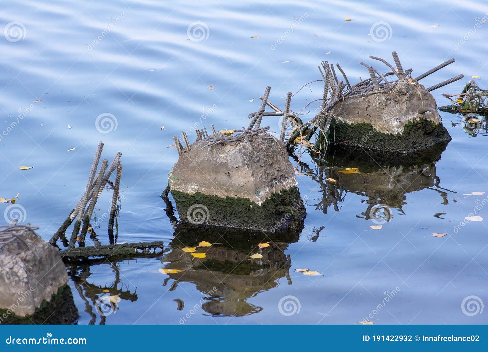 The Old Base of the Bridge. Destroyed Objects in the Water. Stock Photo ... The Old Base of the Bridge. Destroyed Objects in the Water. Stock Photo ...