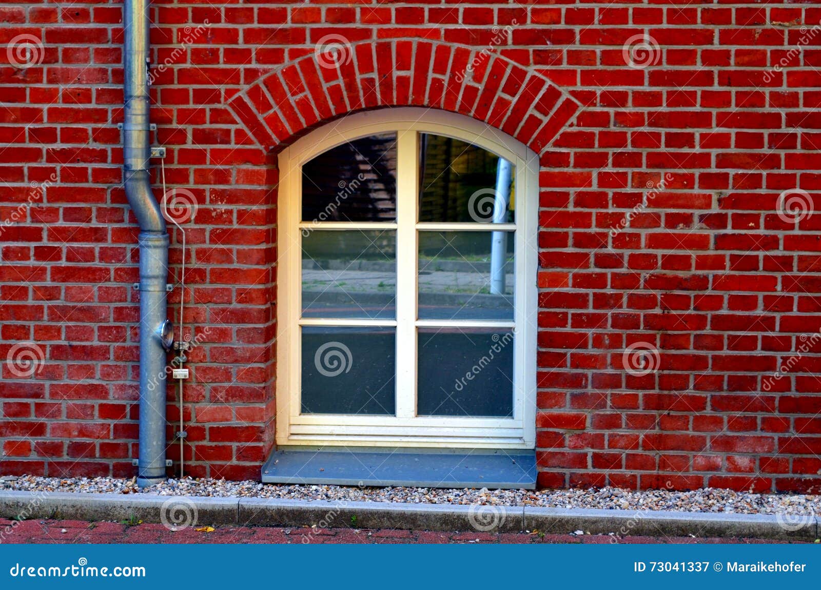 Basement Window Wells On A Building Made From Rusticated Stone And ...