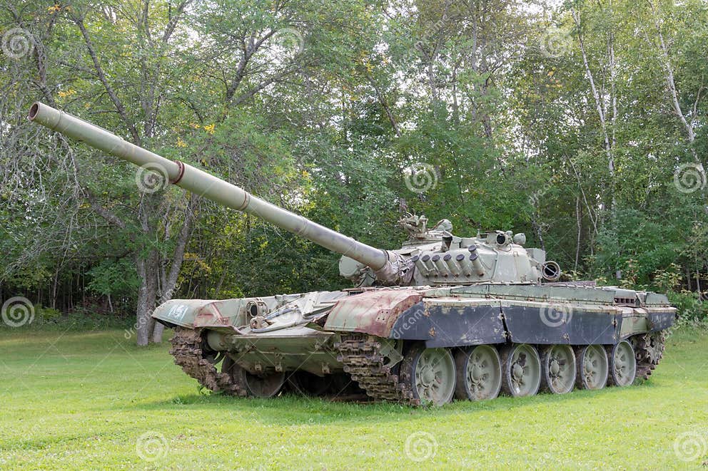 Old battered tank on grass stock photo. Image of machine - 281451542