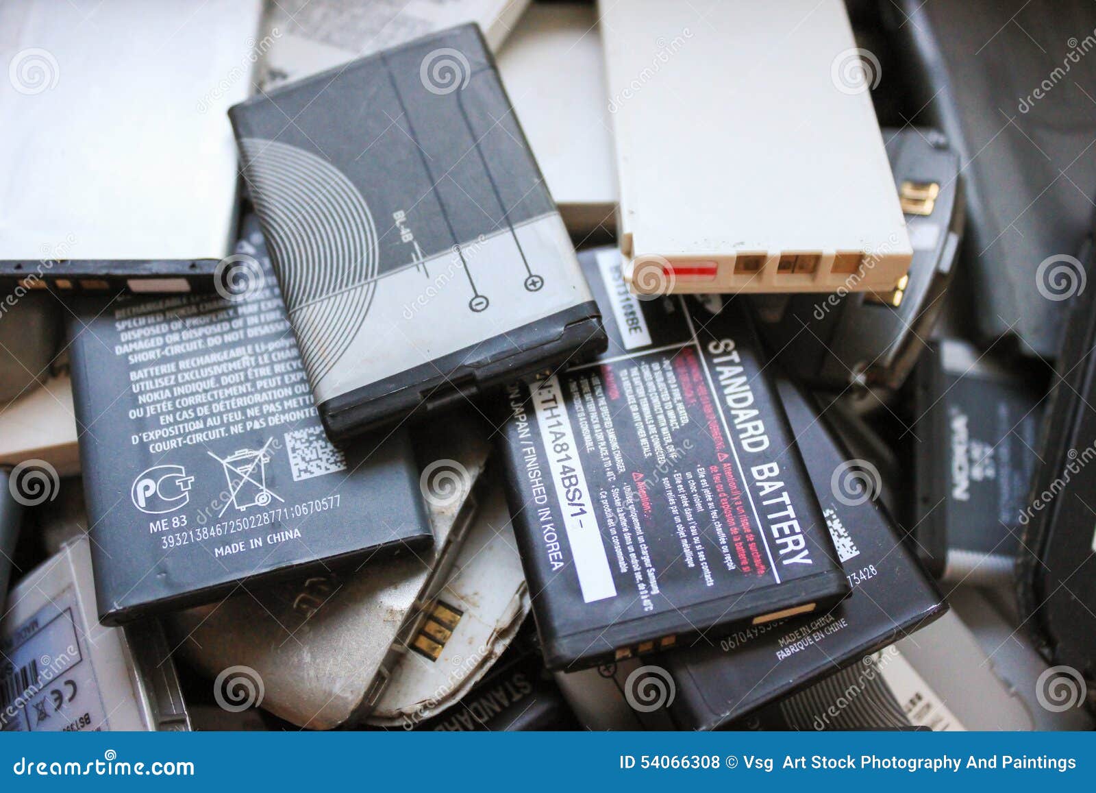 Old Batteries from Mobile Phones Stock Photo - Image of metal ...