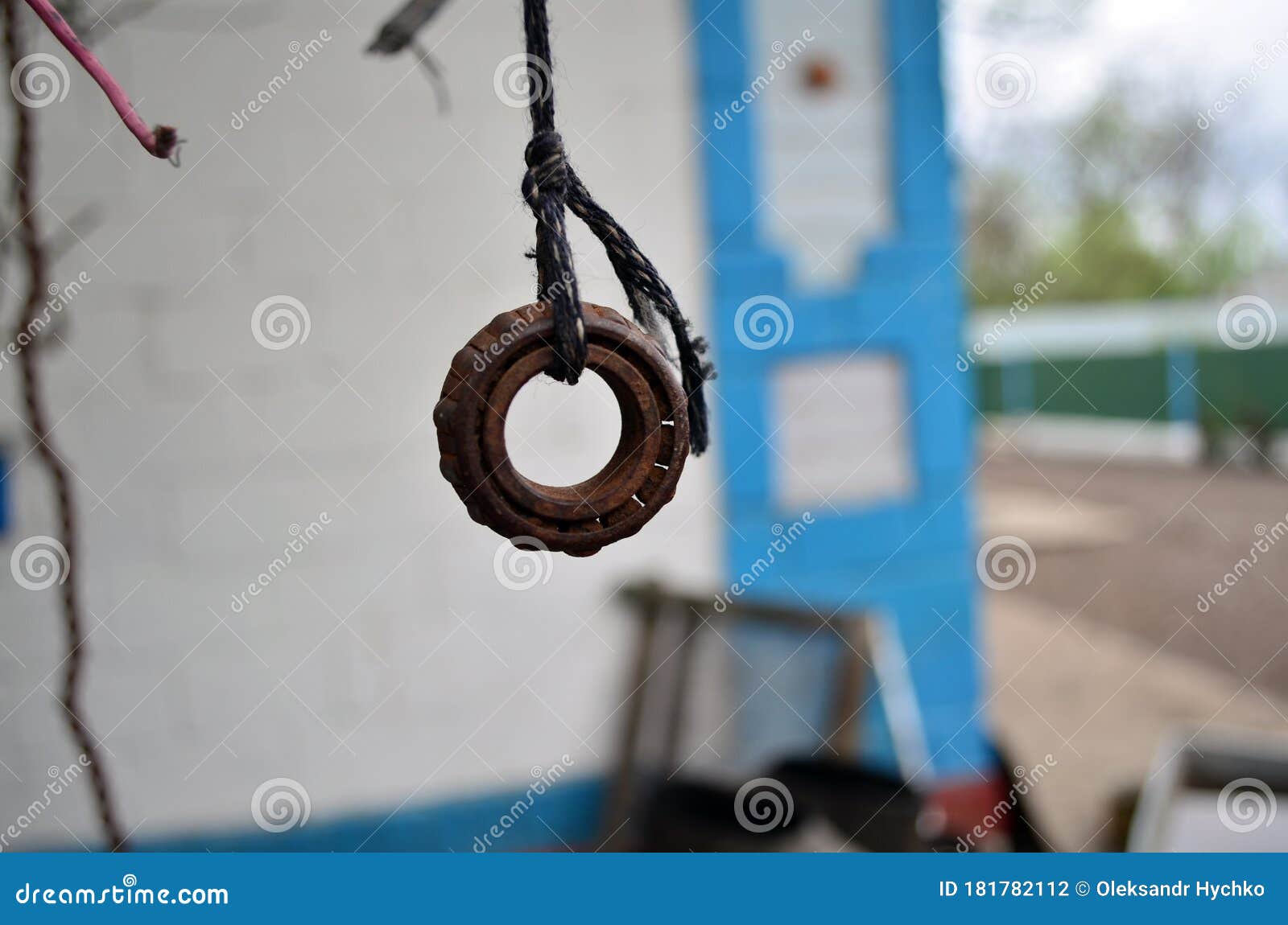 Old Bearing Hanging on a Rope Stock Photo - Image of industry ...