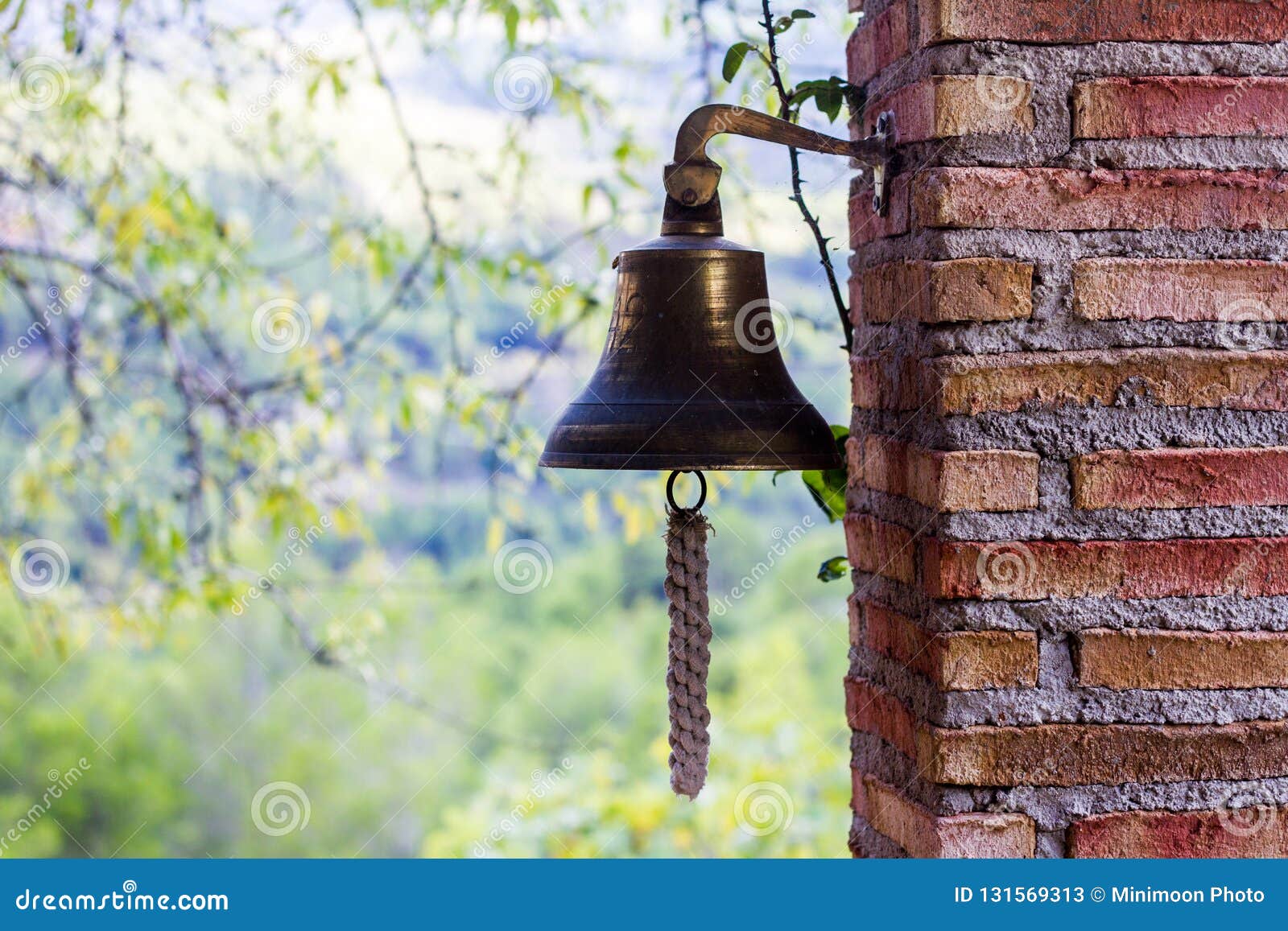 Old bell in a brick column stock image. Image of column - 131569313