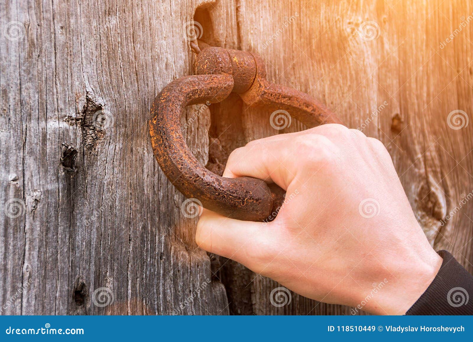Old Bell at the Door, Hand Knocks on the Wooden Door Stock Image ...