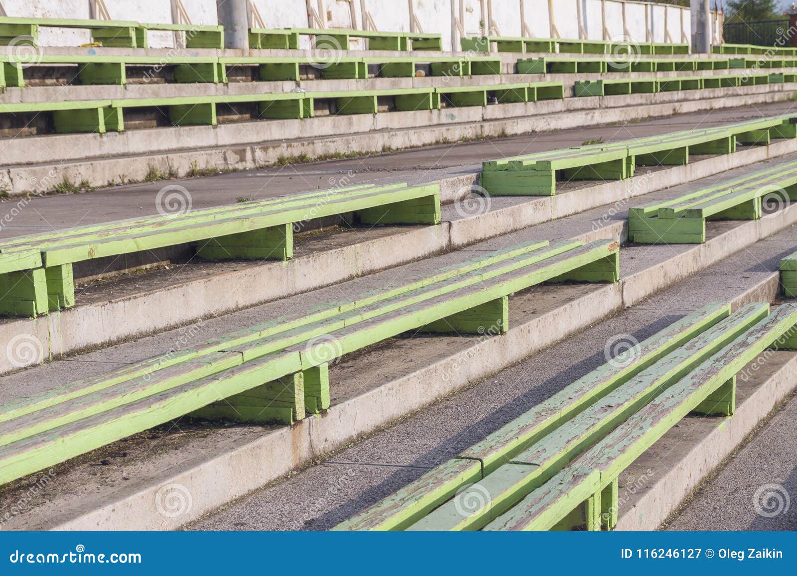 Old benches at the stadium stock image. Image of aisle - 116246127