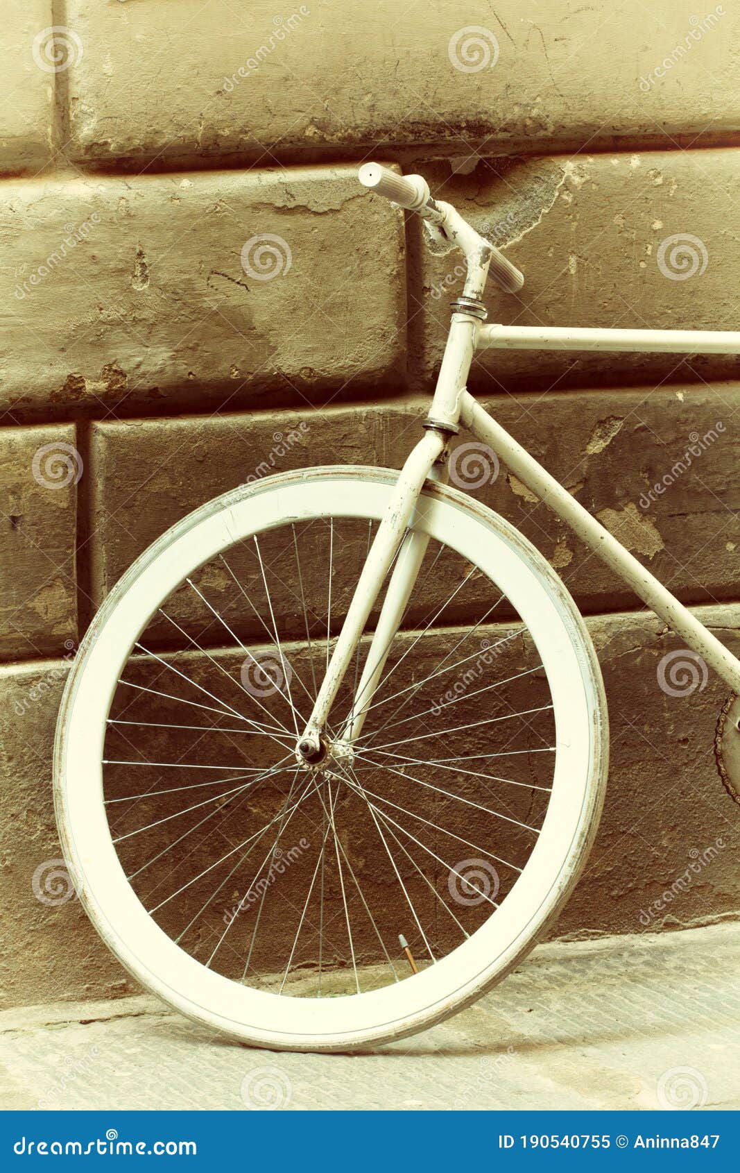 Old Bicycle, Painted White Paint, the Ancient Stone Wall Stock Image ...