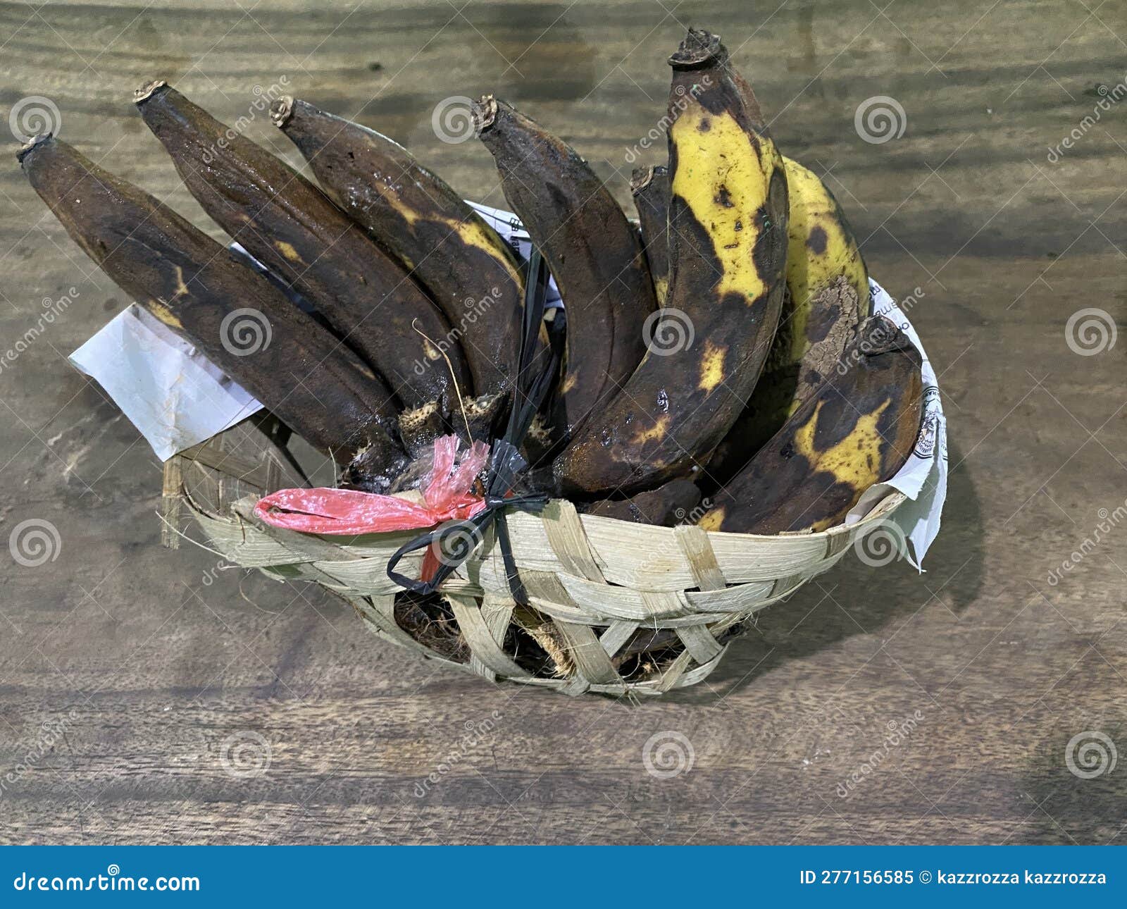 Old Black Old Banana on the Table Inside the Basket Stock Image - Image ...