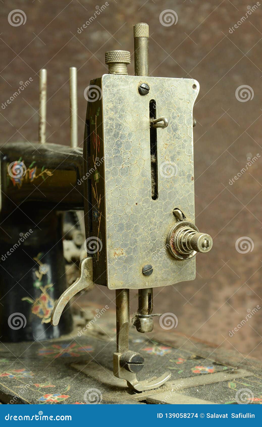 Old Black Sewing Machine on a Sheet of Rusty Iron. Stock Photo - Image ...