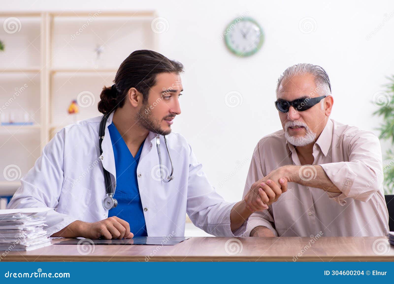 Old Blind Man Visiting Young Male Doctor Stock Photo - Image of doctor ...