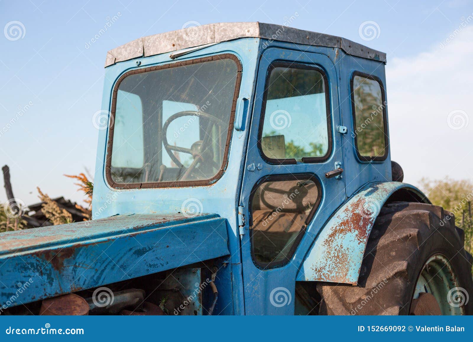 Old Blue Rusted Tractor on the Grass. Stock Photo - Image of farming ...