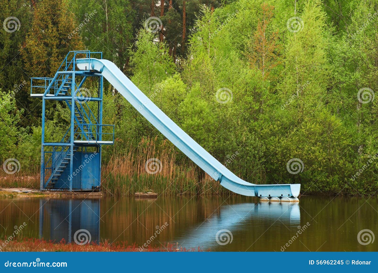Old Blue Sliding Track On Lake Beach, Frozen Watel Level. Winter Time ...