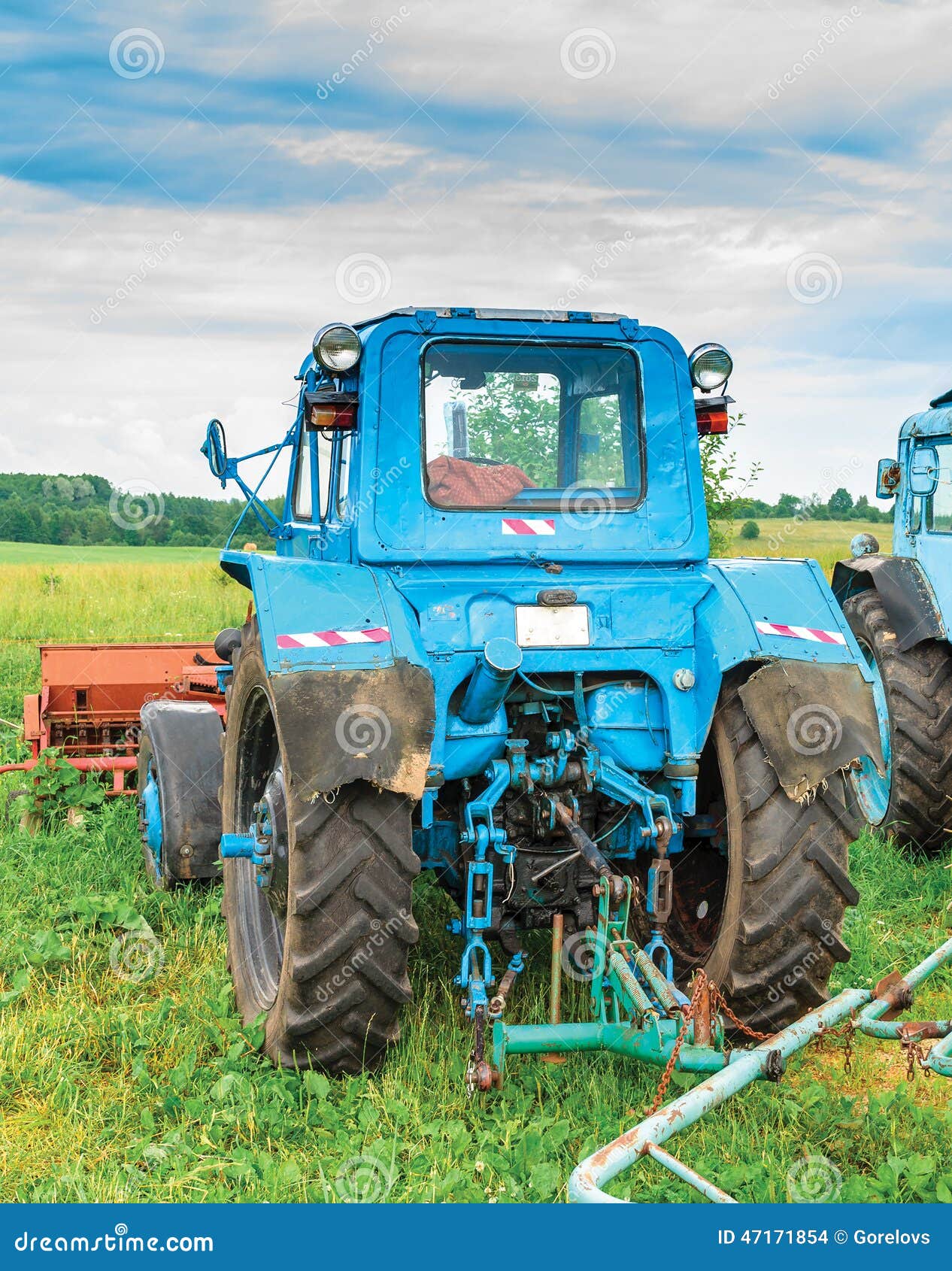 Old blue tractor at farm stock photo. Image of harvest - 47171854