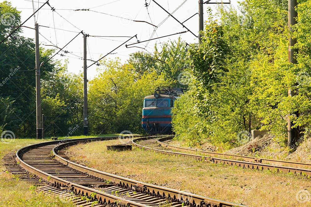 Old Blue Train is Arriving at the Platform at the Railway Station Stock ...