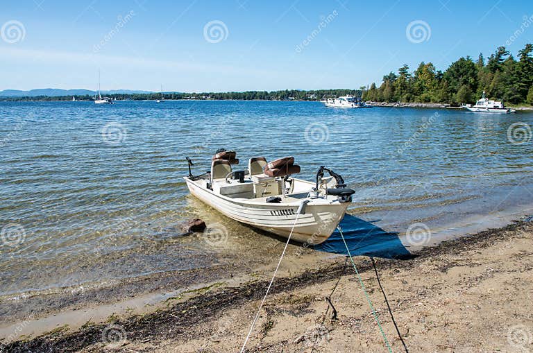 Old boad tied to the beach editorial stock image. Image of scenic ...