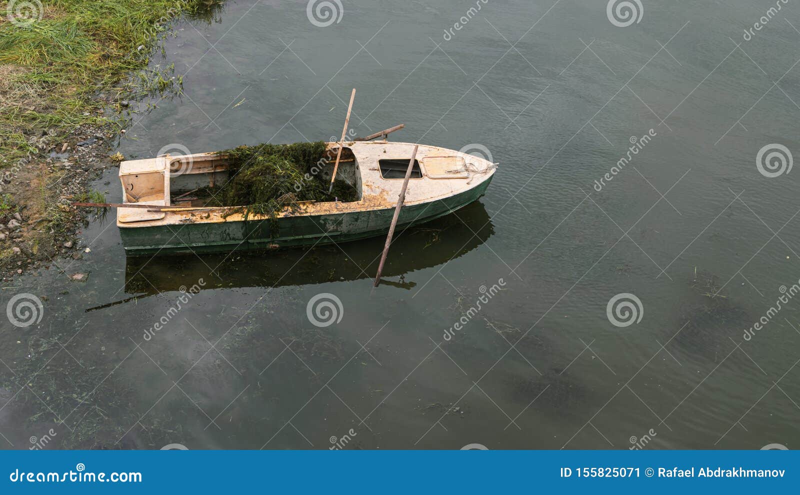 Old Boat in the Lake Near the Shore. Water Purification of the River ...