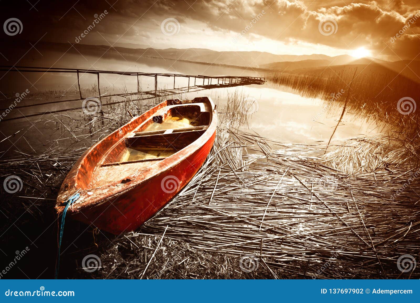 Old Boat on Lake at Sunset stock photo. Image of rowboat - 137697902