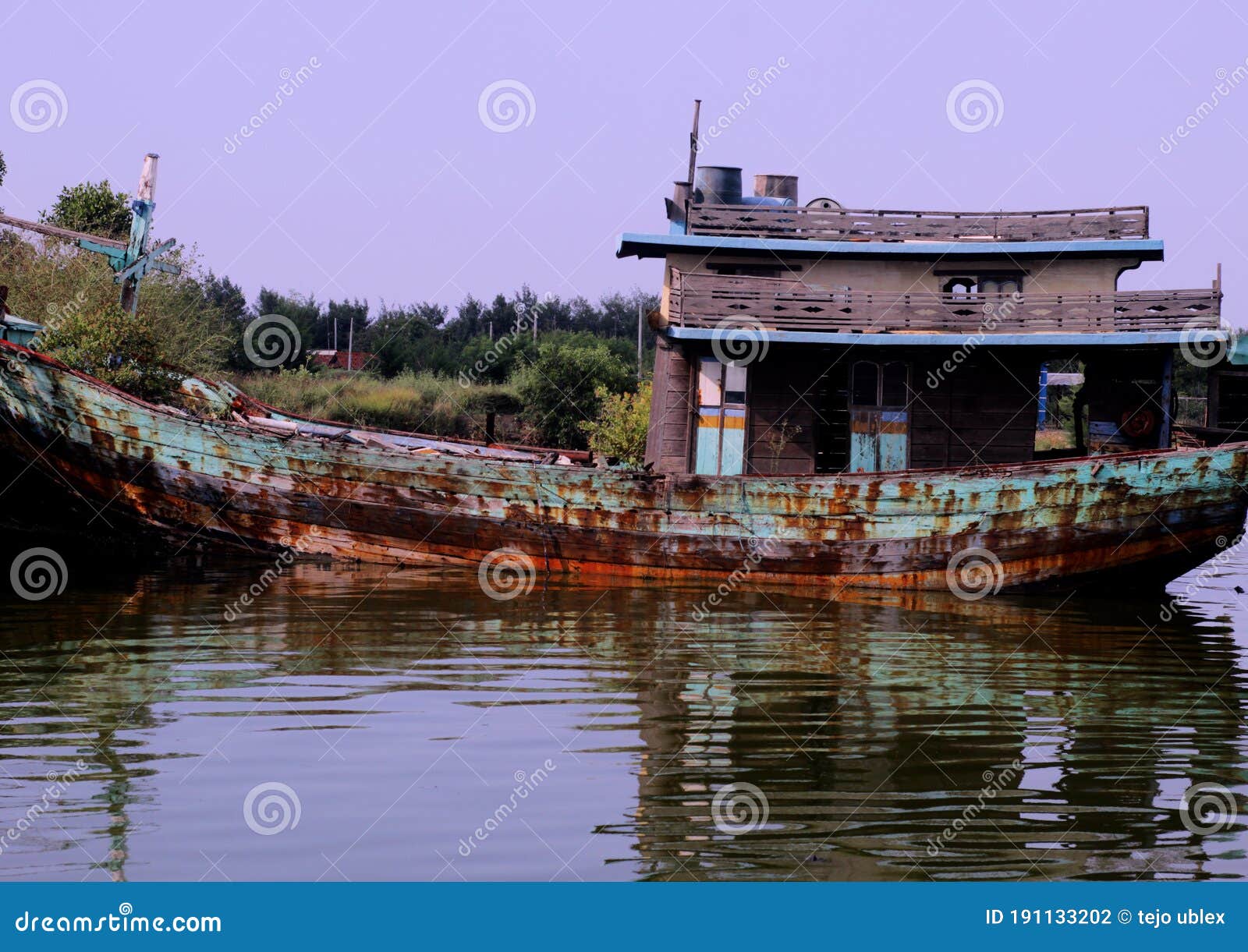 Old boat Lean by the beach stock photo. Image of lake - 191133202