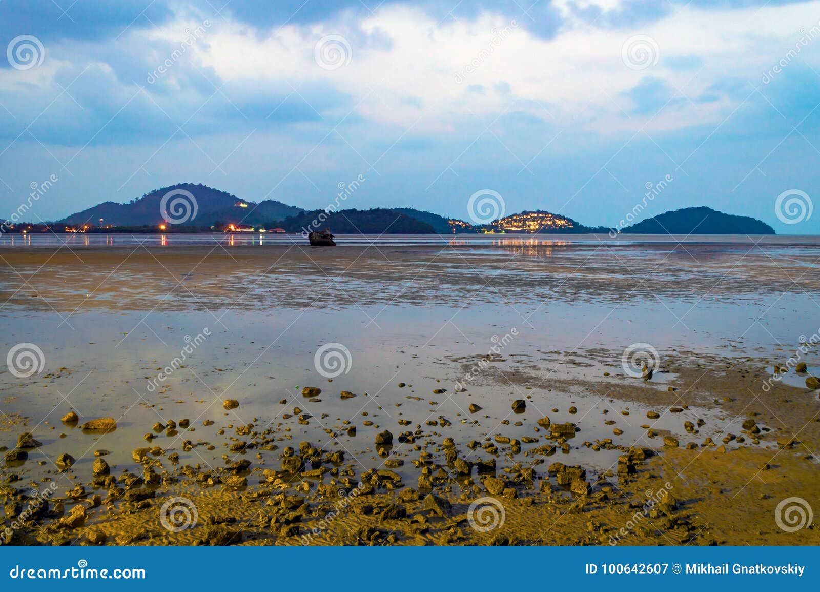 Old Boat Stranded during Low Tide in the Background at Evening Time ...
