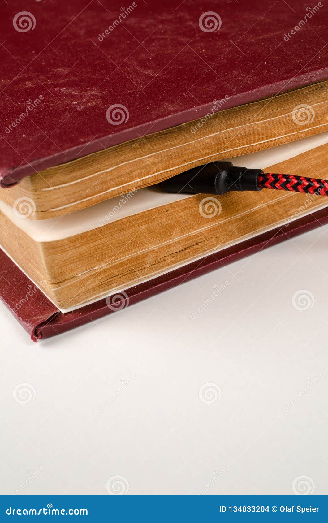 Old Book with a Battery Charging Cable Stock Photo - Image of ...