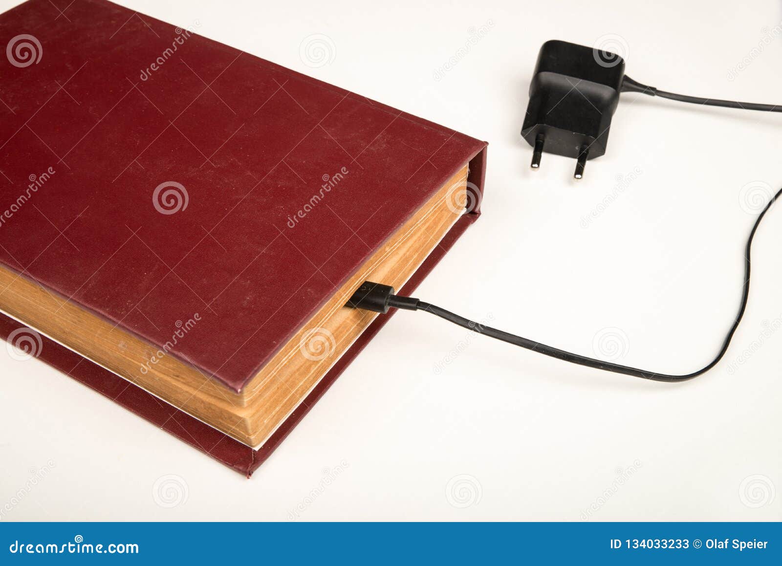 Old Book with a Battery Charging Cable Stock Image - Image of classic ...