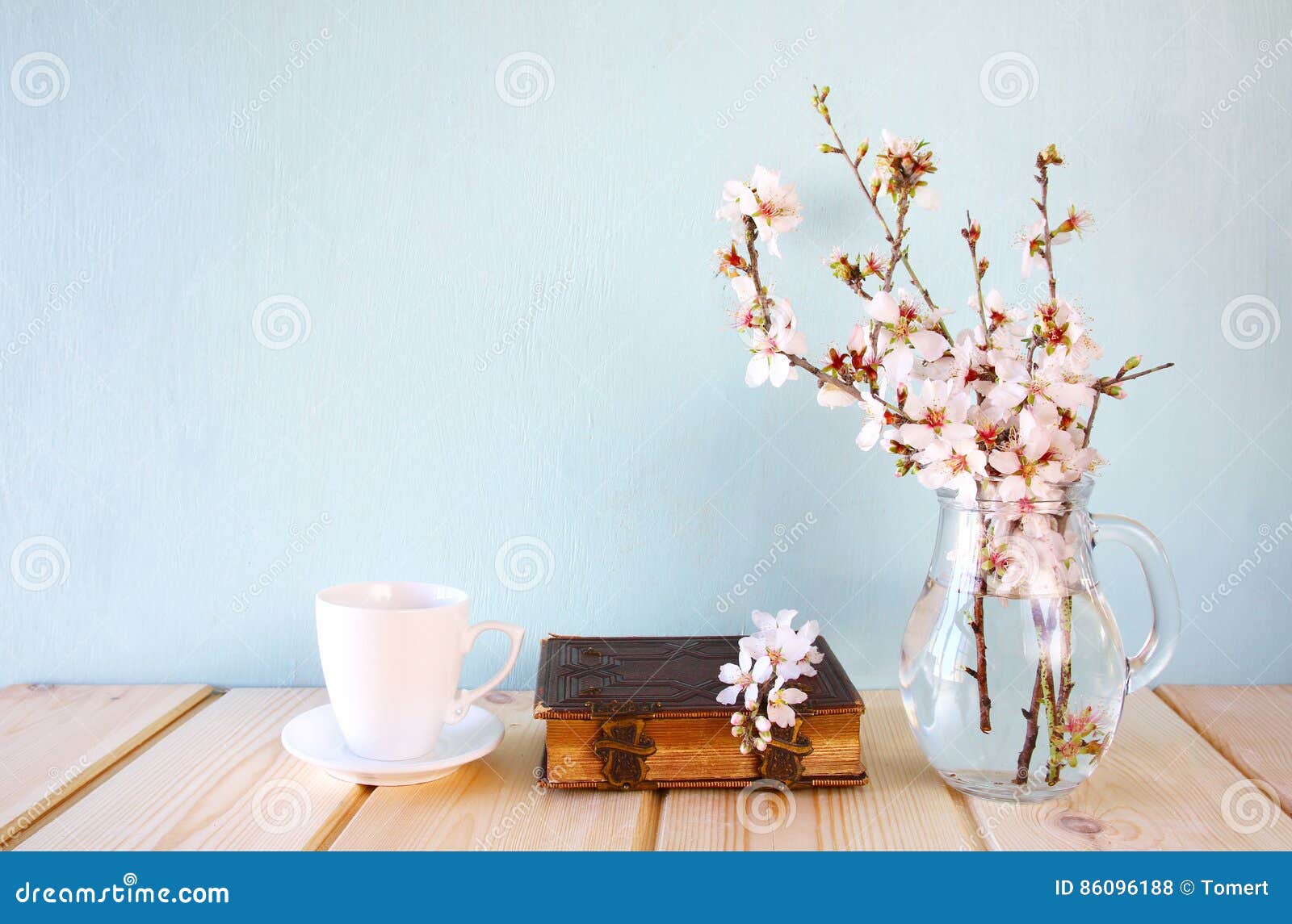Old Book, Cup of Coffee Next To Spring White Flowers Stock Photo ...