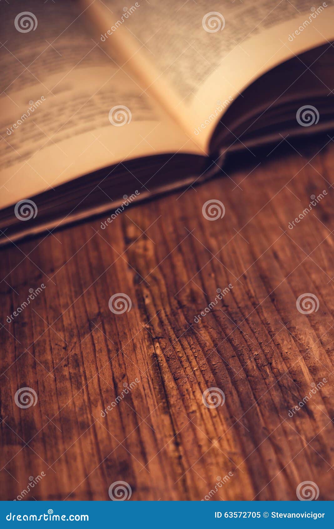 Old book on library desk stock image. Image of publishing - 63572705